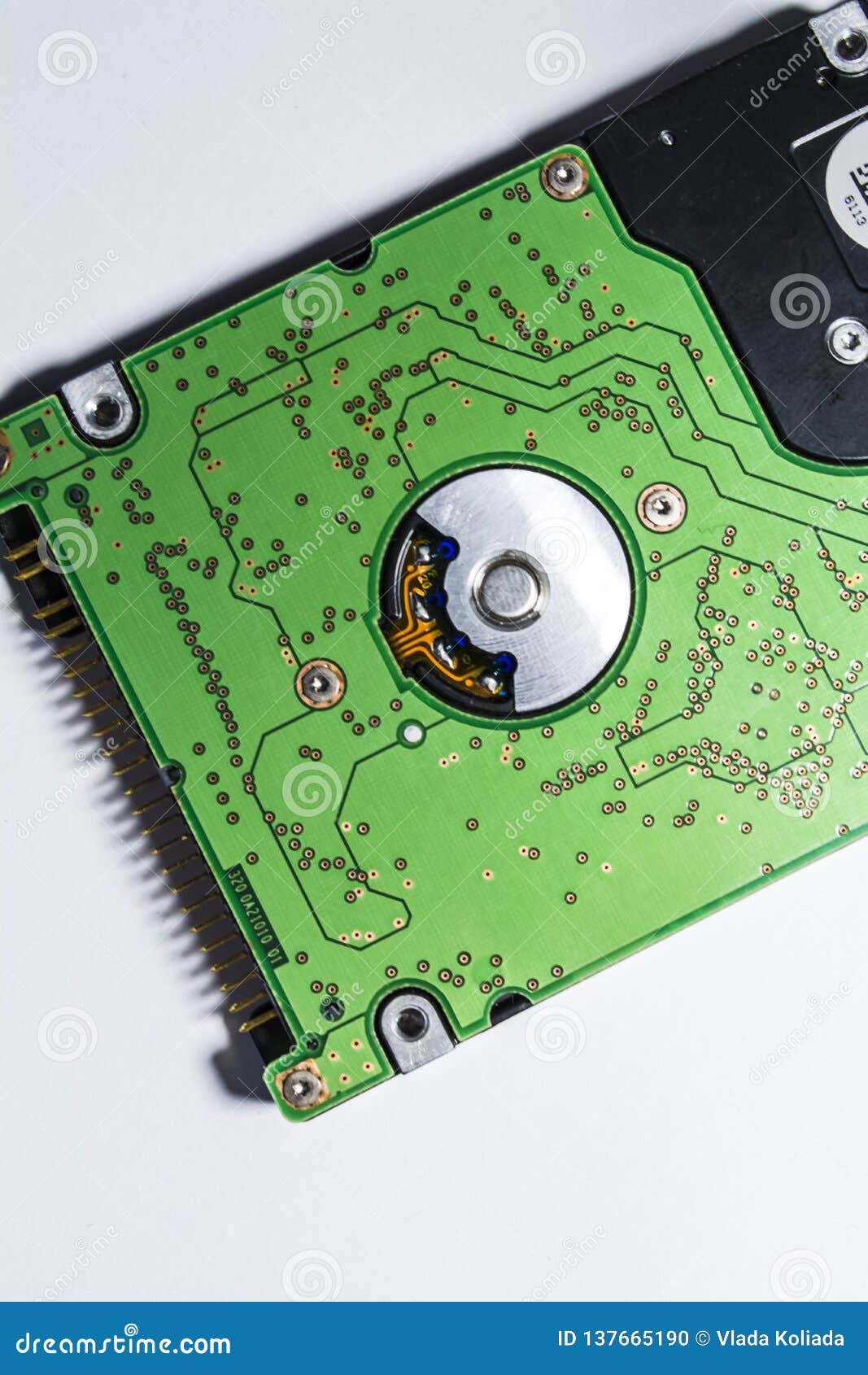 Winchester of Green Color. Hard Drive. Motherboard. Computer Spare ... Winchester of Green Color. Hard Drive. Motherboard. Computer Spare ...