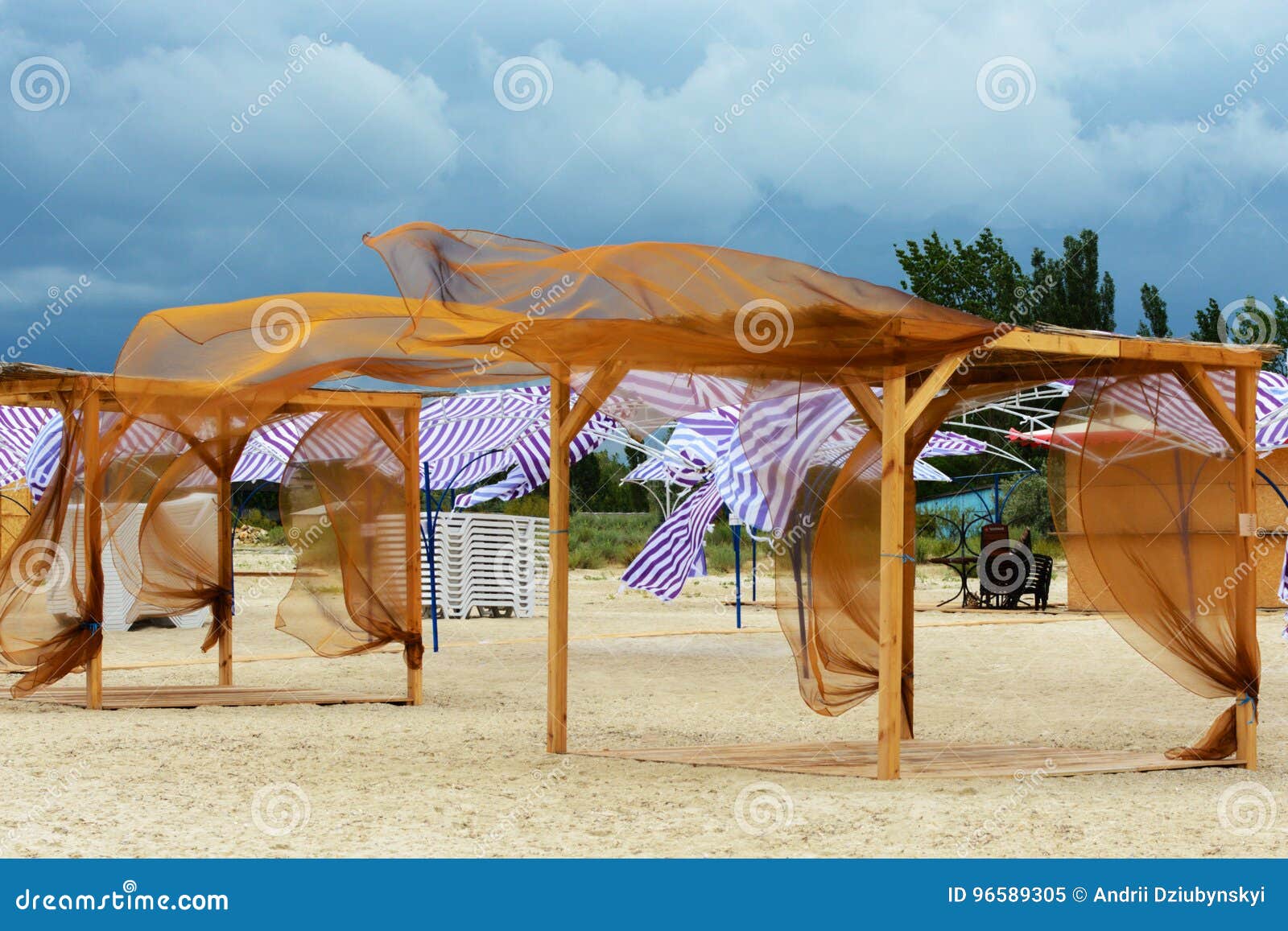 The Wind on the Beach Shakes the Canopy Curtains for a Shadow. Stock ...