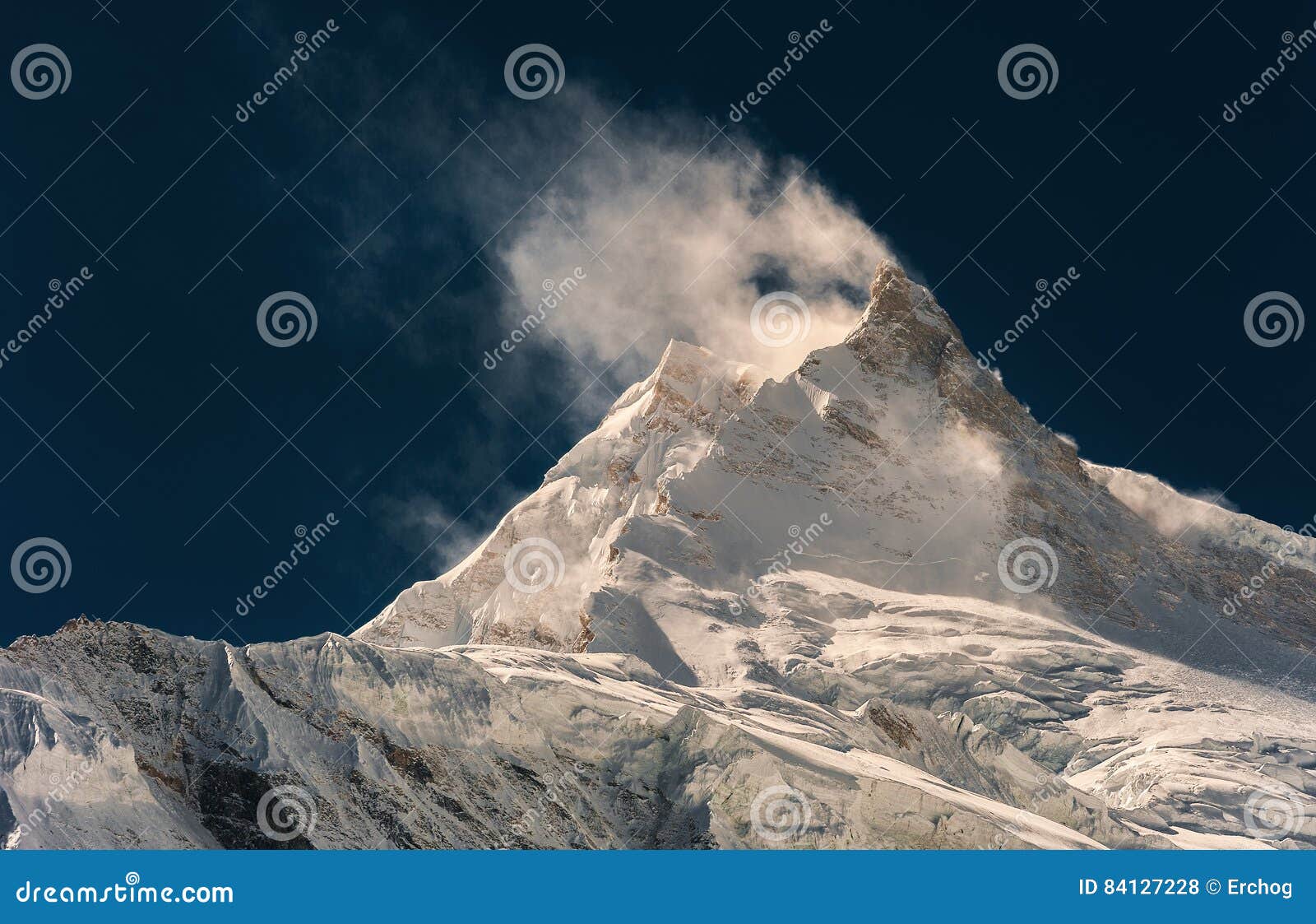 Wind Blowing Snow from Mountain Peak Stock Photo - Image of nature ...