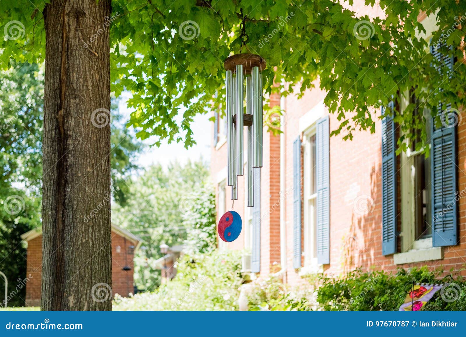 Wind Chime on a Tree in a Backyard Stock Image - Image of bamboo ...