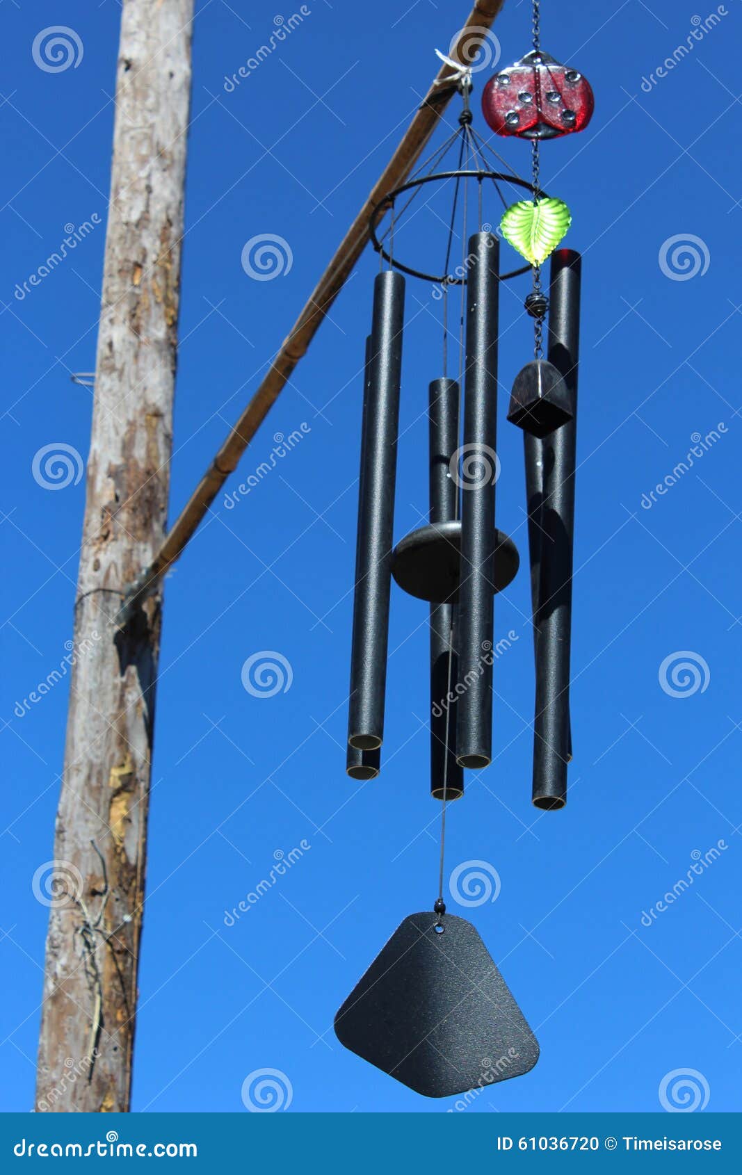 Wind Chimes with a Blue Sky Stock Photo - Image of wind, bright: 61036720