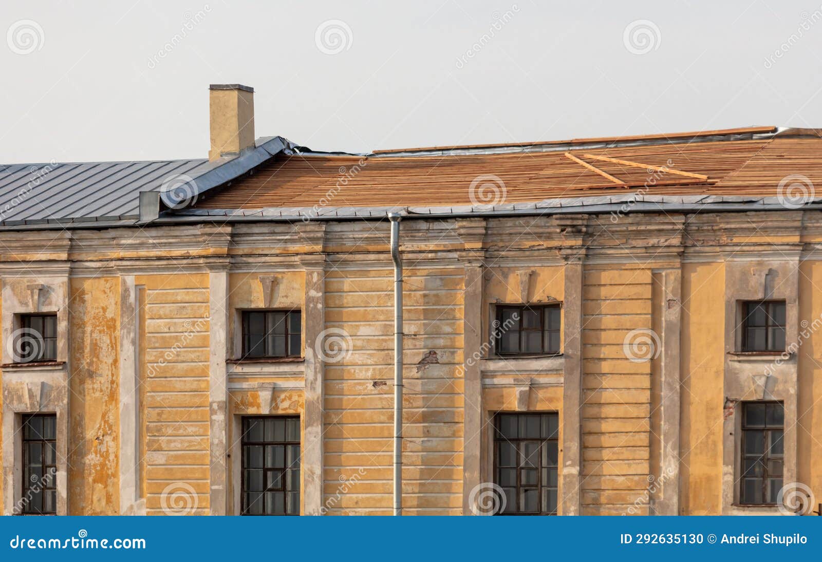Wind-damaged Roof of a Building Stock Photo - Image of damage, storm ...
