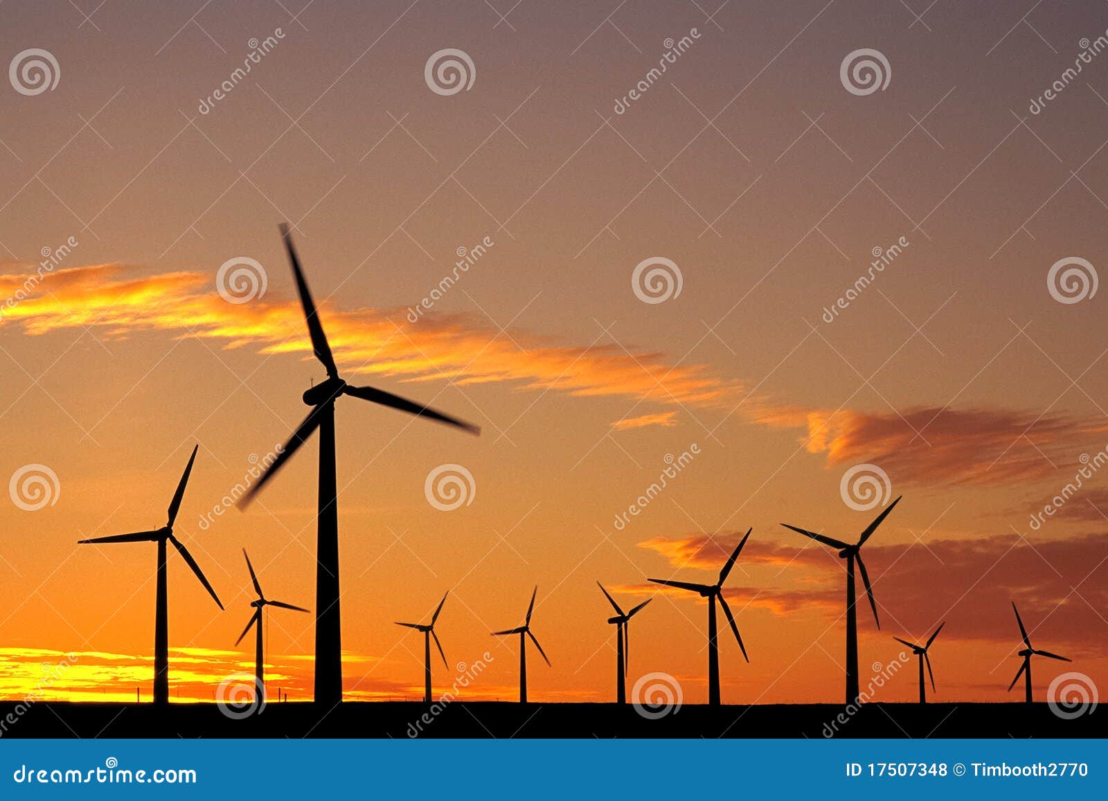 Wind farm at sunset stock photo. Image of efficiency - 17507348