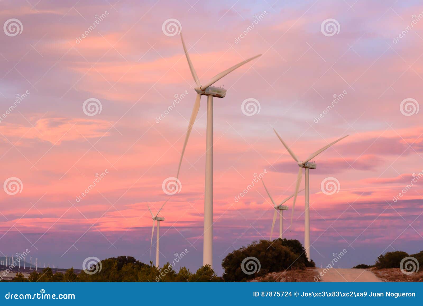 Wind farm at sunset stock photo. Image of environmental - 87875724