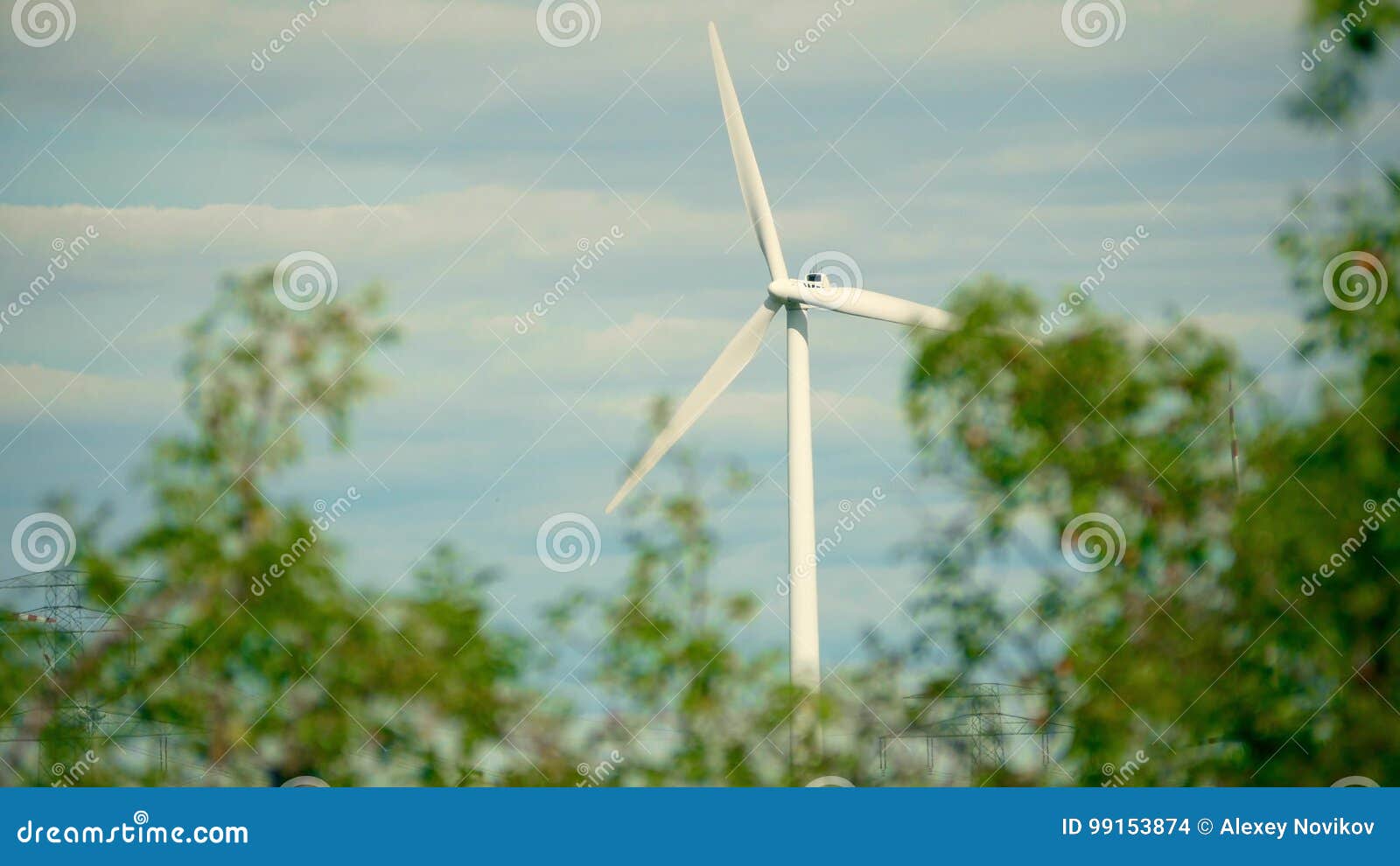 Wind Generator Behind Waving Green Tree Leaves Stock Photo - Image of ...