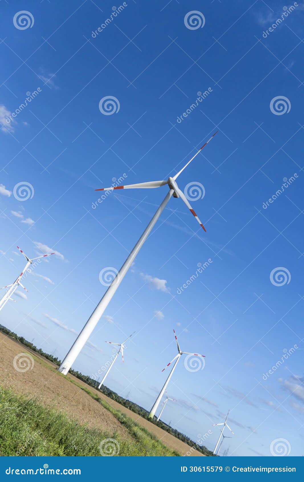 Wind generator on field stock image. Image of generator - 30615579