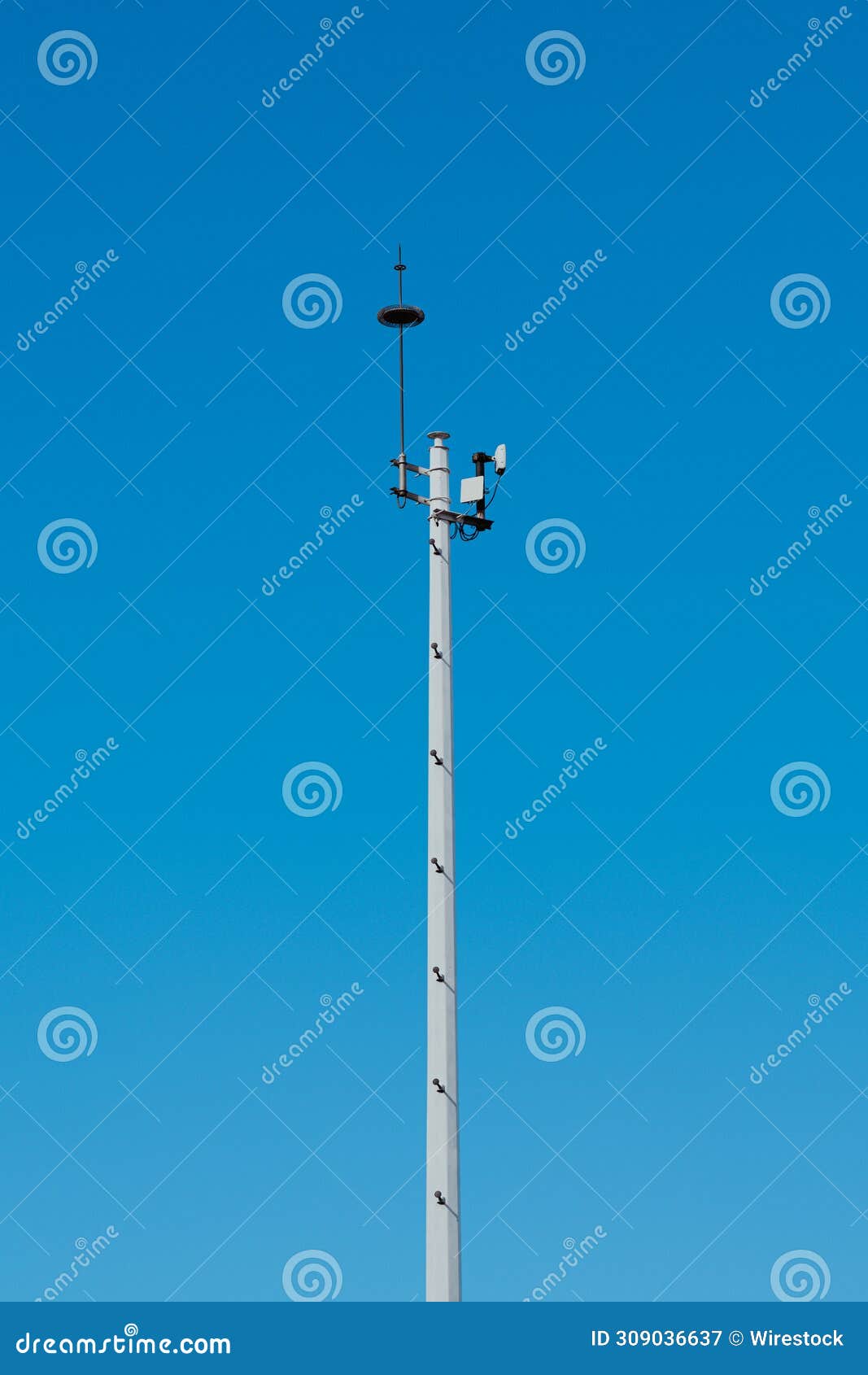 Wind Indicator on Top of a Light Pole. Stock Image - Image of ...