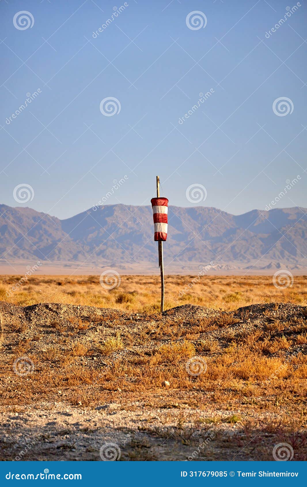 A Wind Indicator on a Stick at a Steppe Airfield Against the Background ...