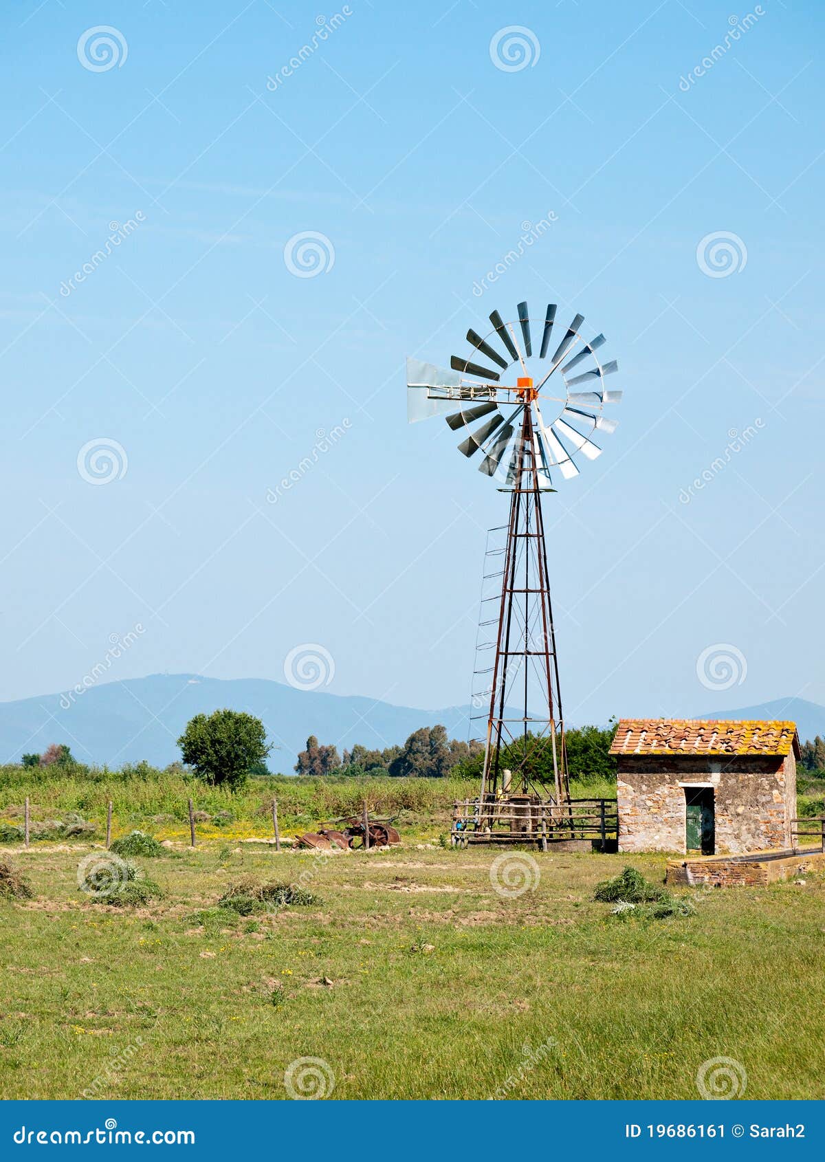 Wind irrigation water pump stock image. Image of irrigation - 19686161