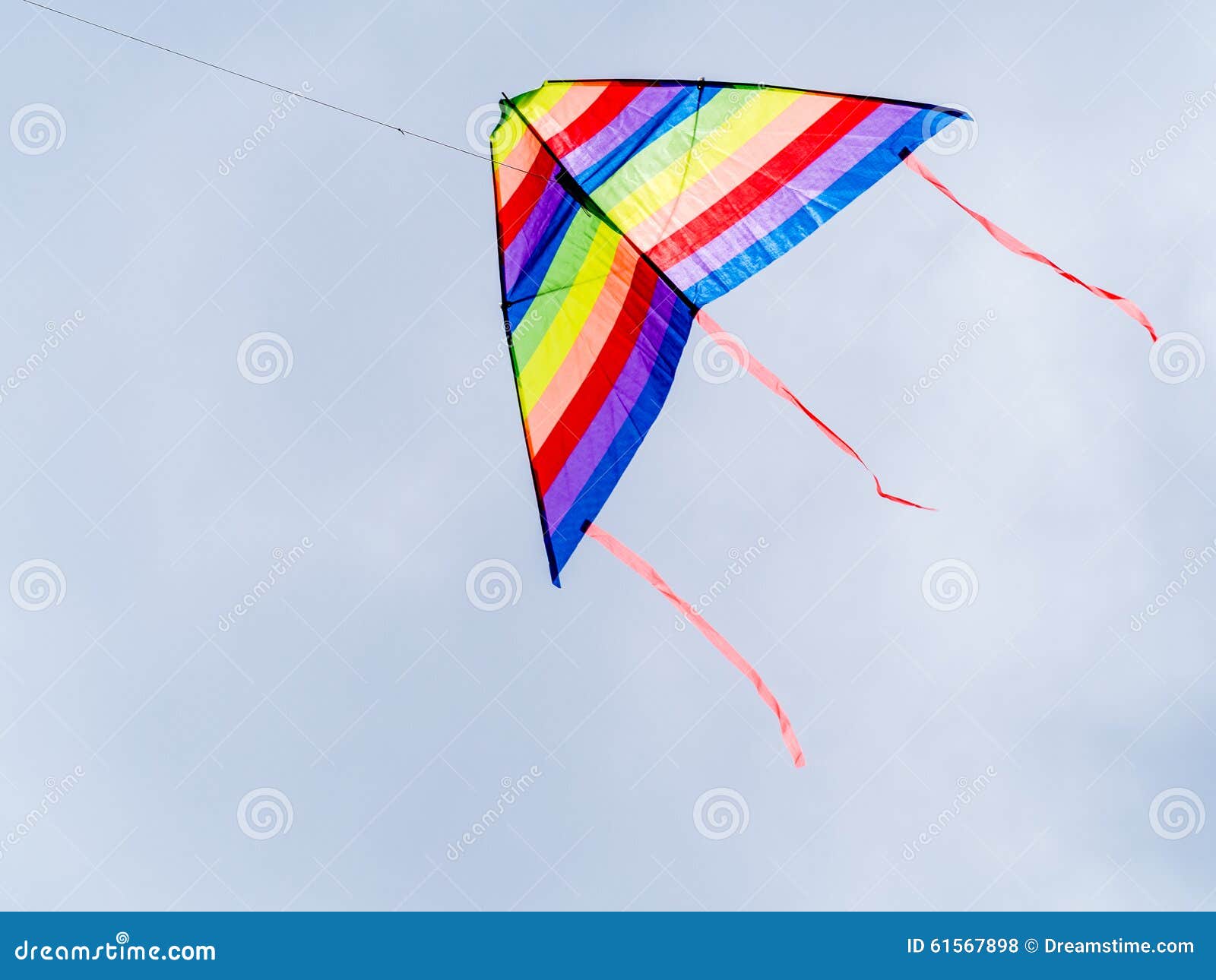 Wind Kite Flying in a Blue Sky Stock Photo - Image of color ...