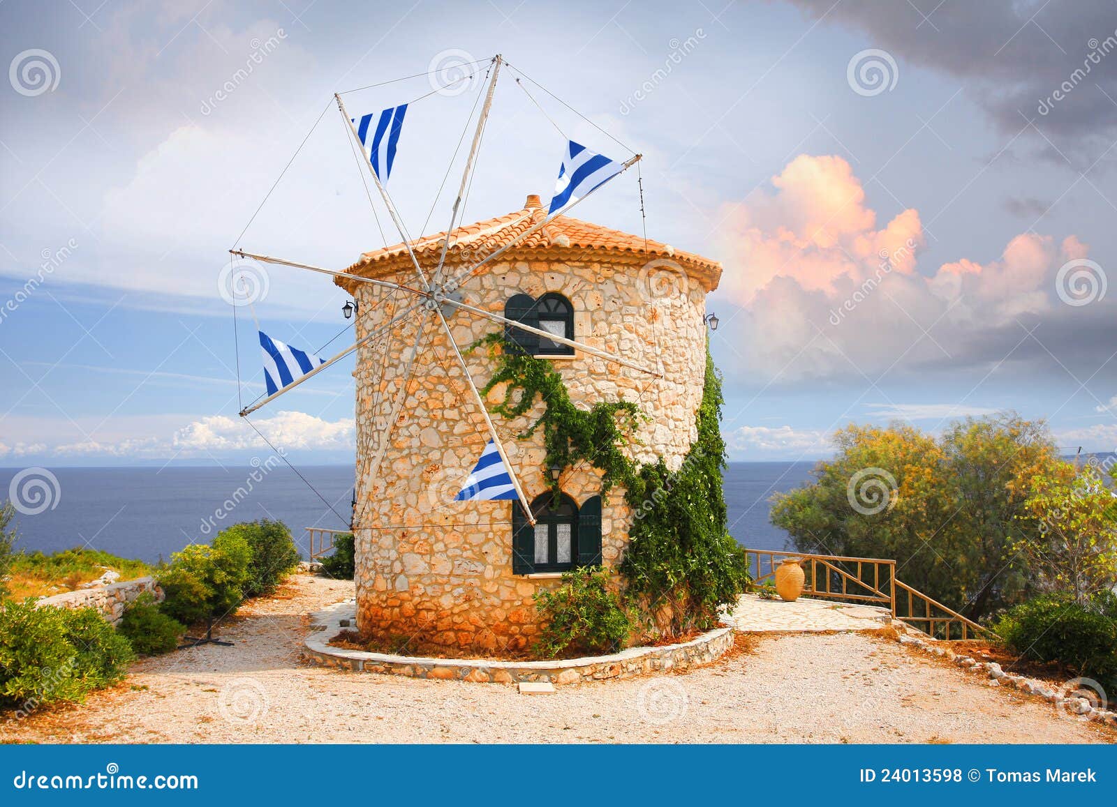 Wind mill in Greek islands stock photo. Image of outdoors - 24013598