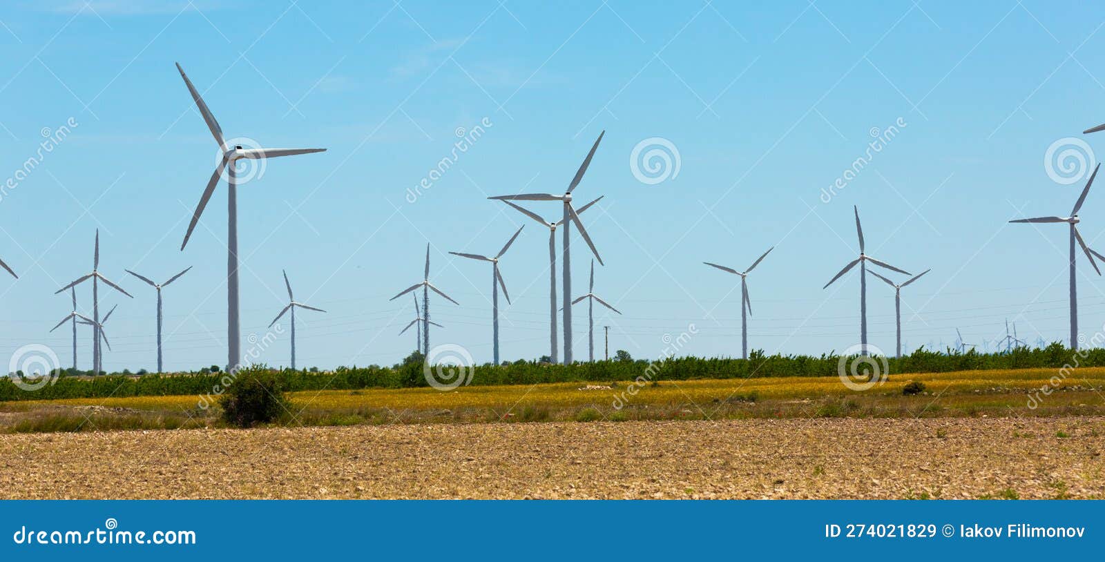 Wind power plants on field stock image. Image of area - 274021829