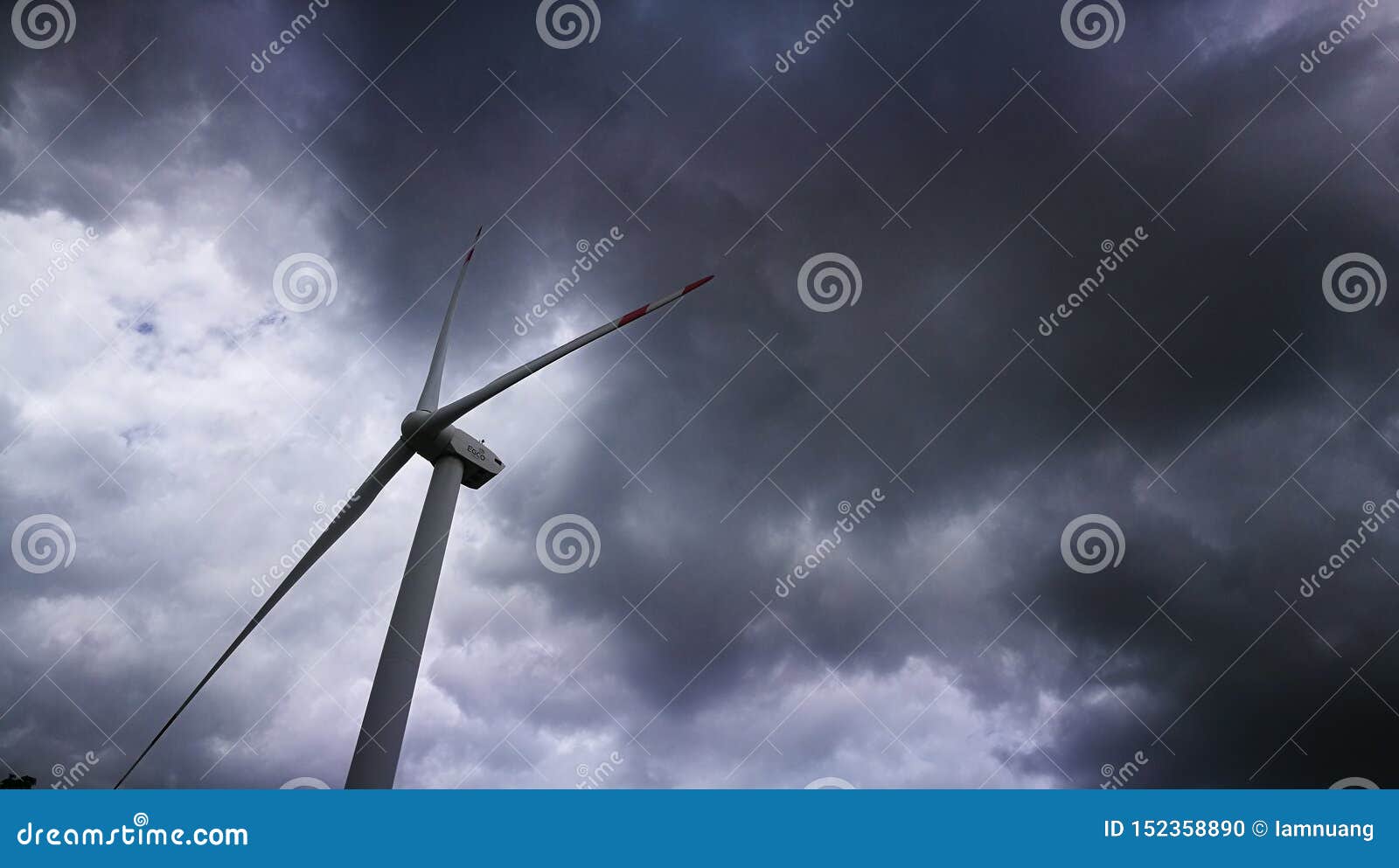 Wind Power Unit Standing Alone with Glommy Rain Clouds Surrounding ...