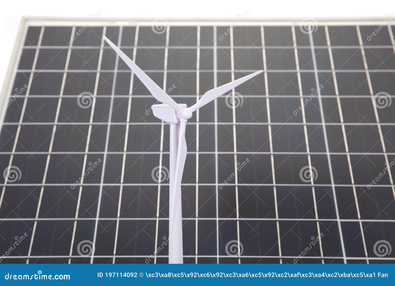 Wind Power Windmill in Front of Solar Panels Background Stock Photo ...
