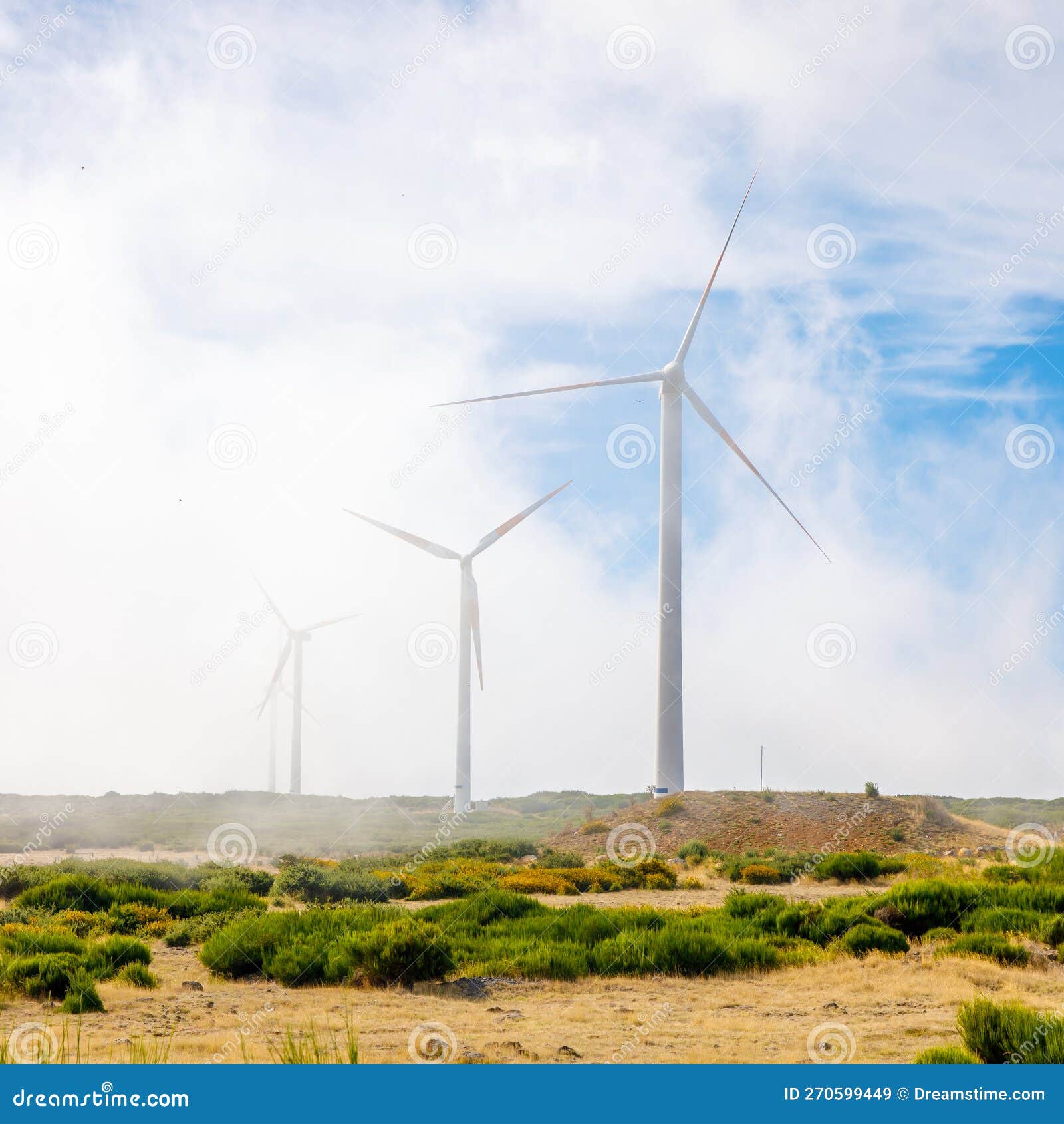 Wind Propeller Turbines on a High Mountain Field among the Clouds ...