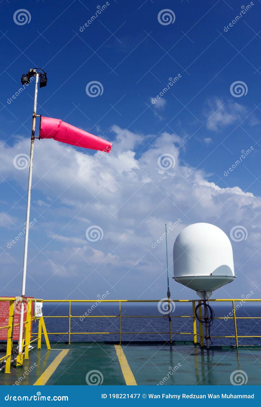 Wind Sock on a Pole on Board a Construction Work Barge at Oil Field ...