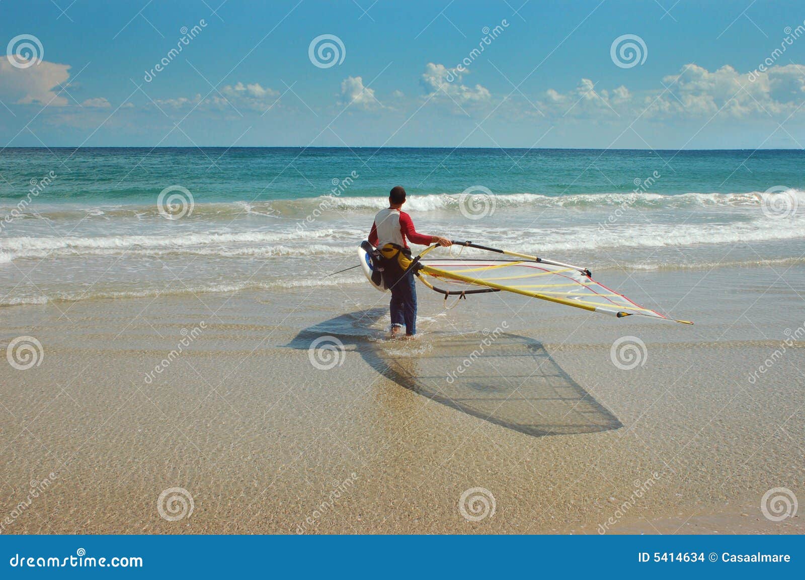 Wind surfer on beach stock photo. Image of walking, surfboard - 5414634