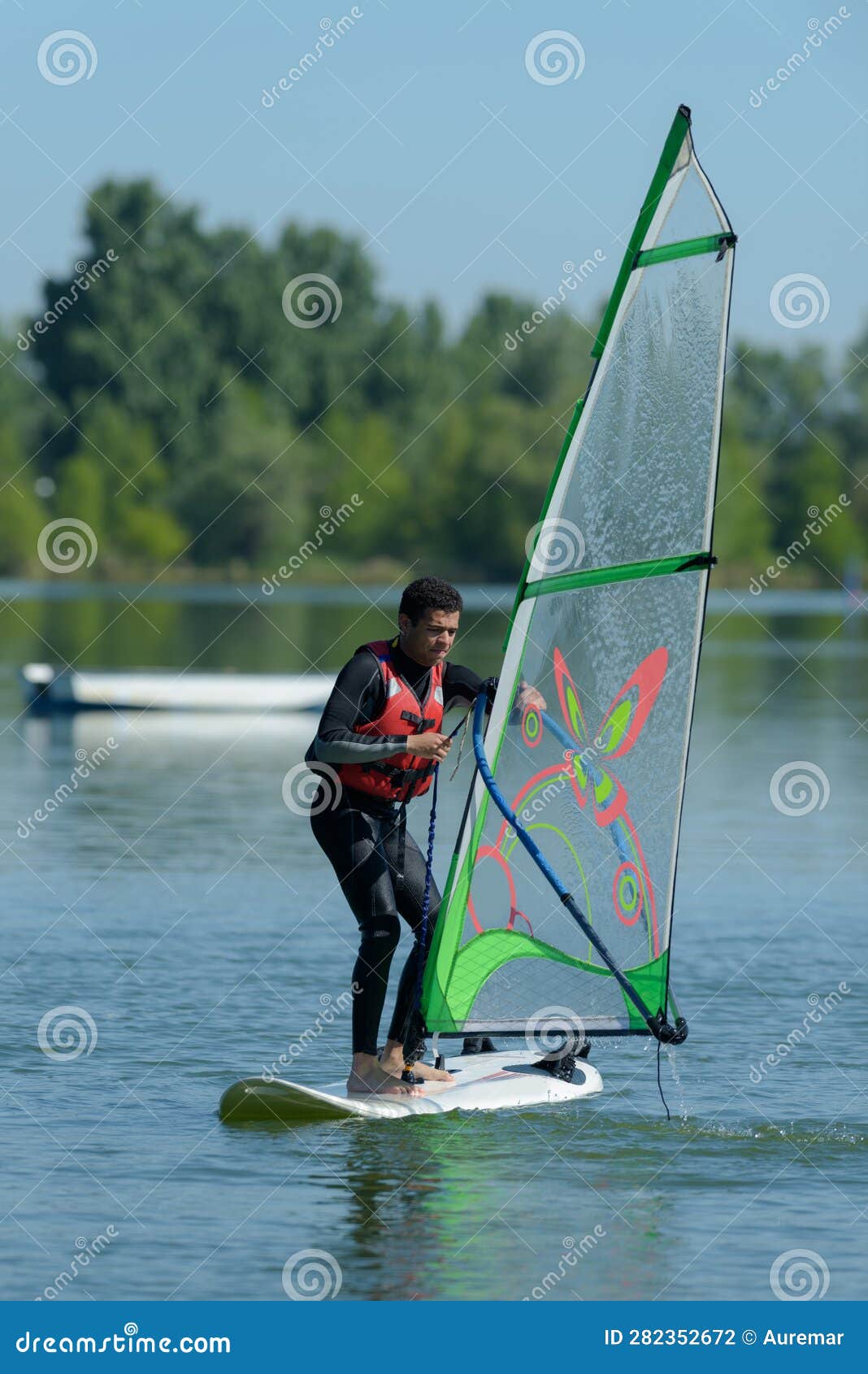 Wind surfer in lake stock photo. Image of surfing, waves - 282352672