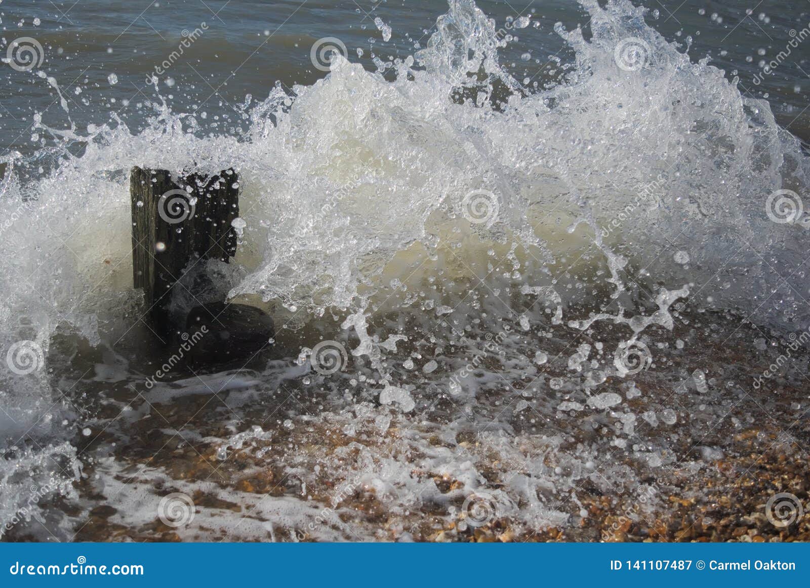 The wind taking a wave. stock image. Image of post, beach - 141107487