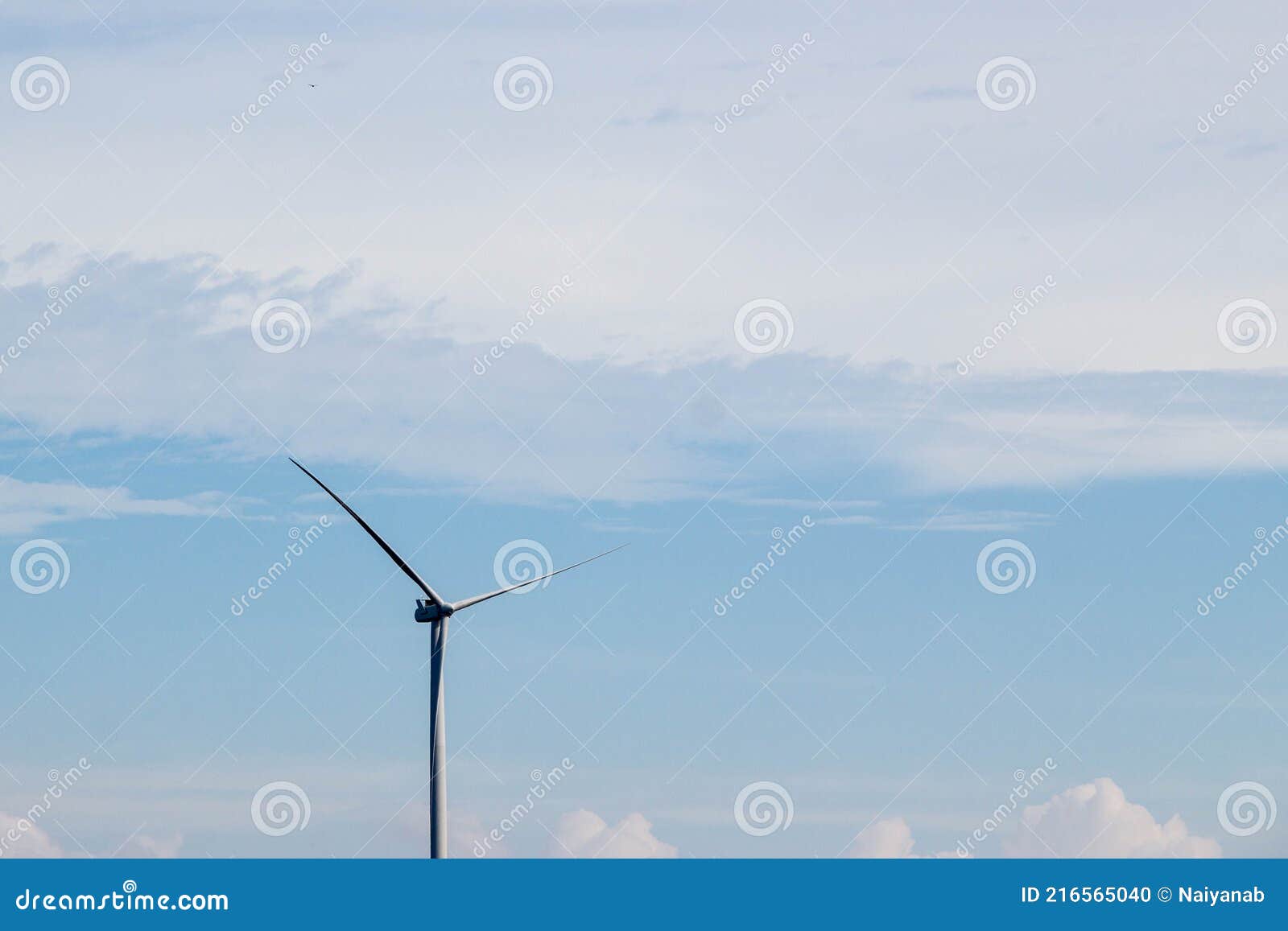 Wind turbine on blue sky stock photo. Image of energy - 216565040