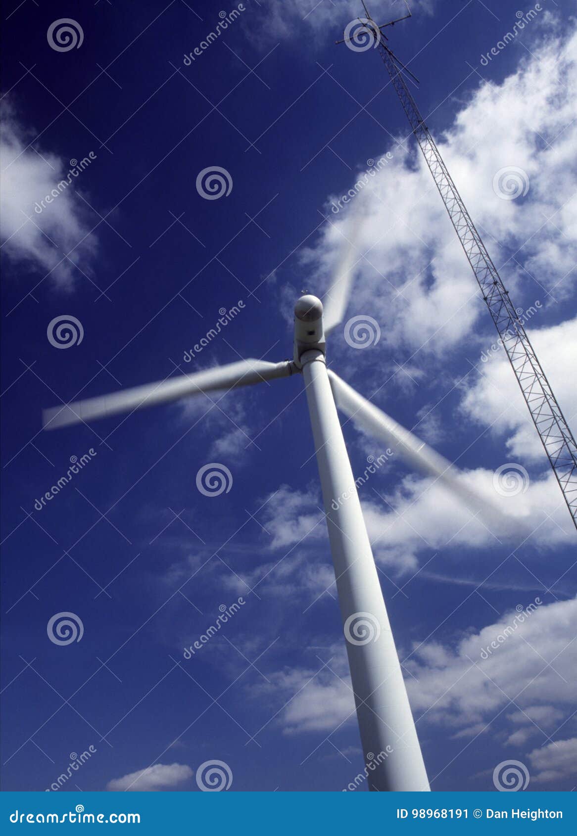 Wind Turbine and Communications Antenna Stock Image - Image of cloud ...