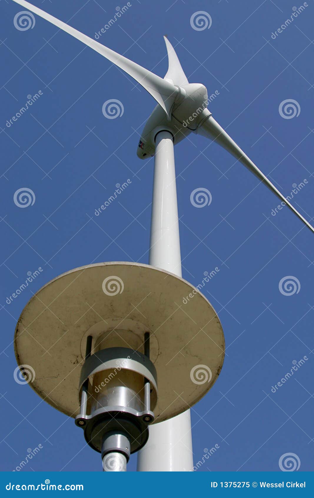 A Wind Turbine and a Lamp Post Stock Image - Image of blade, creating ...