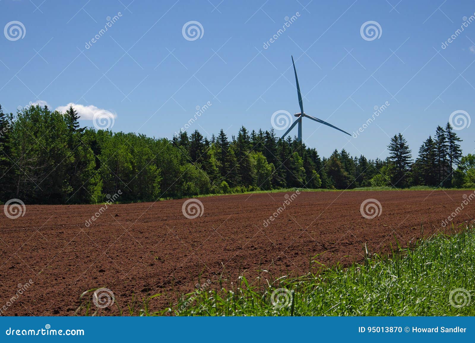 WInd turbine in PEI stock photo. Image of blue, island - 95013870