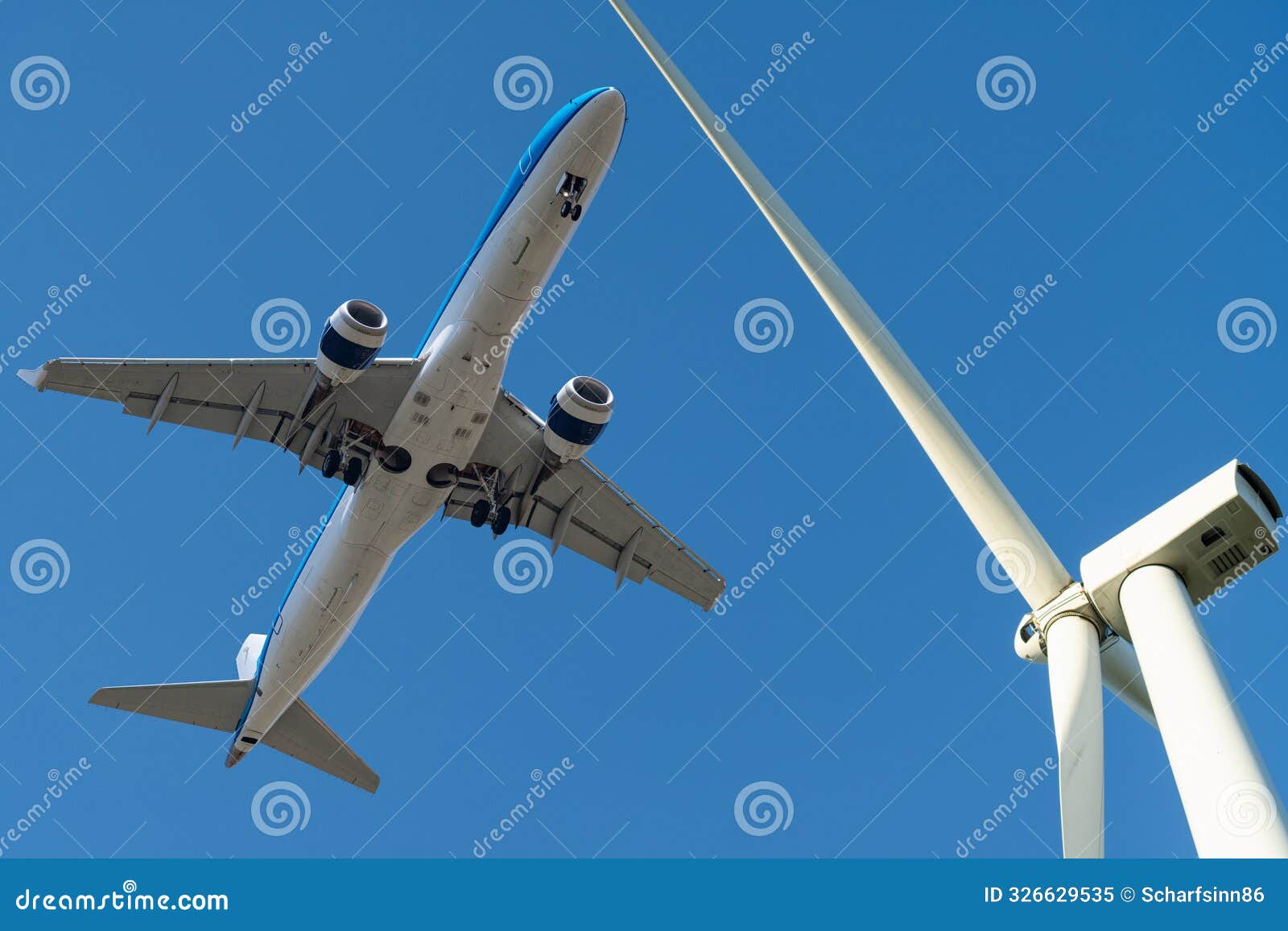 Wind Turbine and Plane in the Blue Sky Stock Image - Image of clean ...