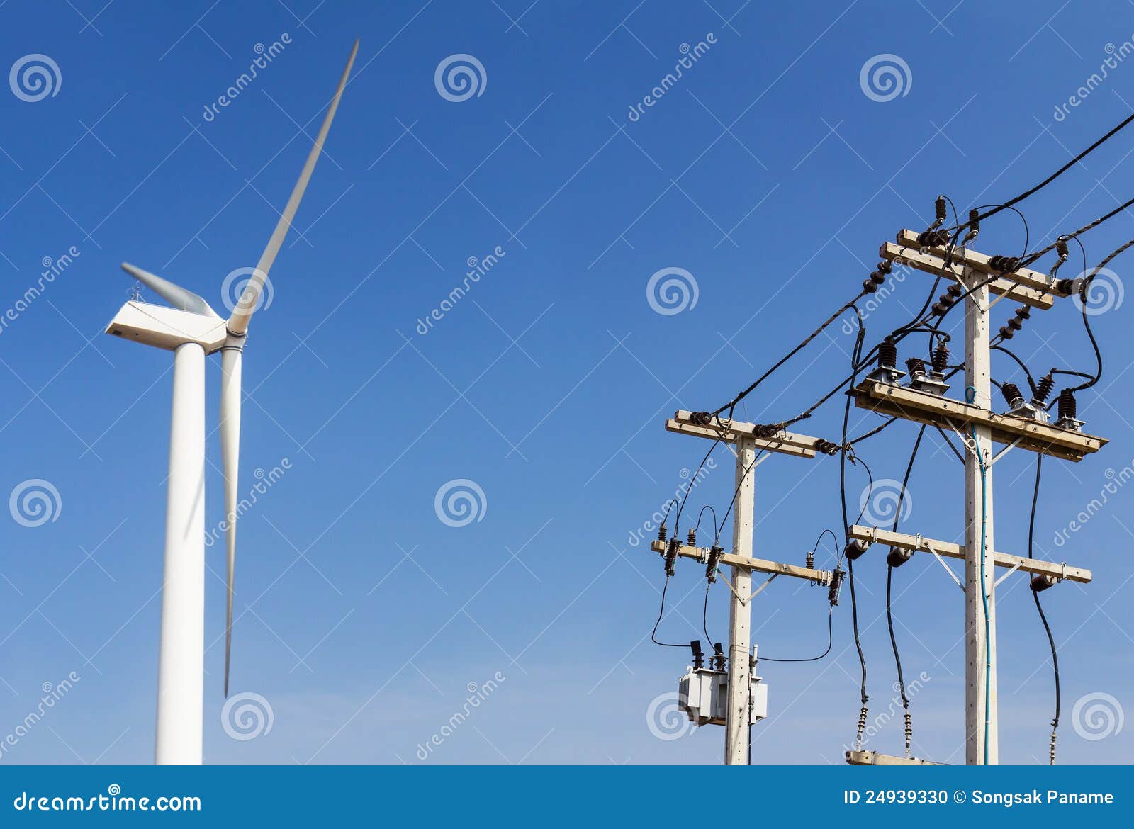 Wind Turbine and Power Lines Transporting Stock Photo - Image of ...