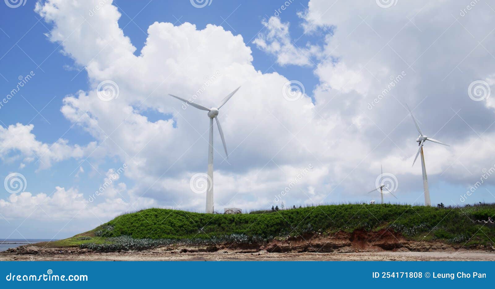 Wind turbine at seaside stock photo. Image of nature - 254171808