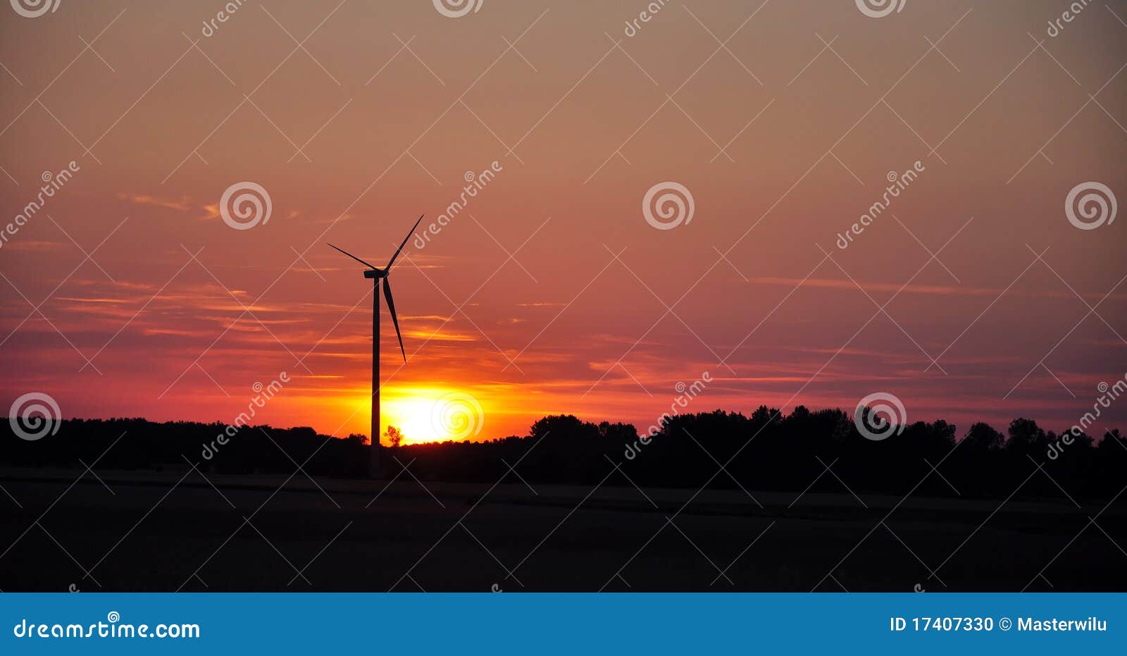 Wind turbine during sunset stock photo. Image of perspective - 17407330