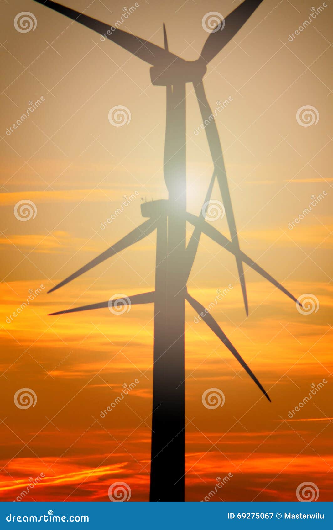 Wind turbine at sunset stock image. Image of green, global - 69275067