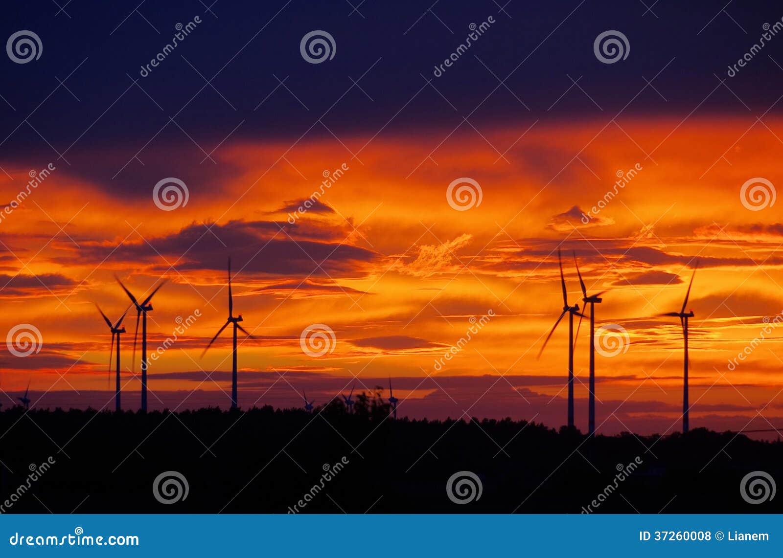 Wind turbine sunset stock photo. Image of silhouette - 37260008