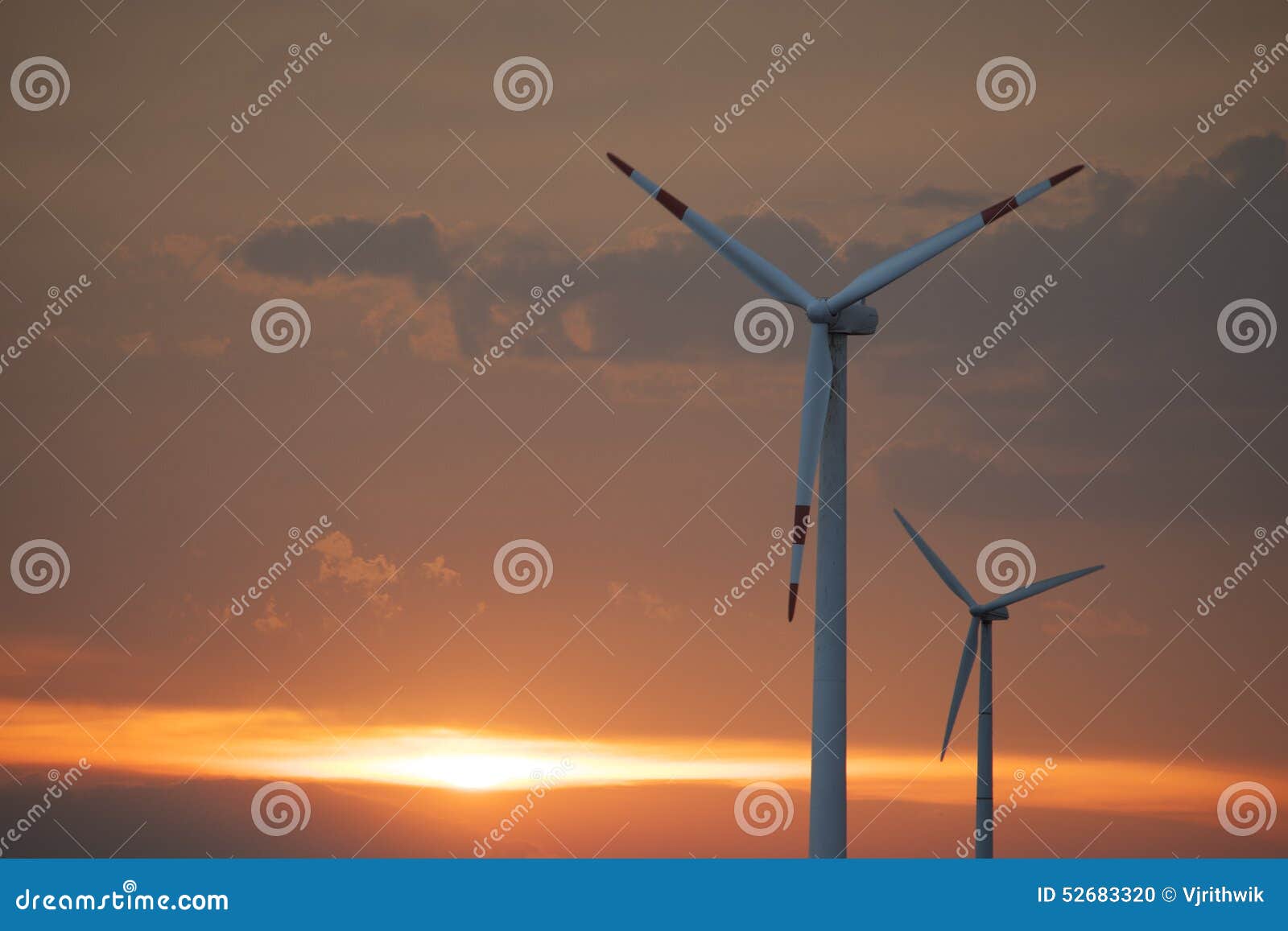 Wind turbine at sunset stock photo. Image of propeller - 52683320