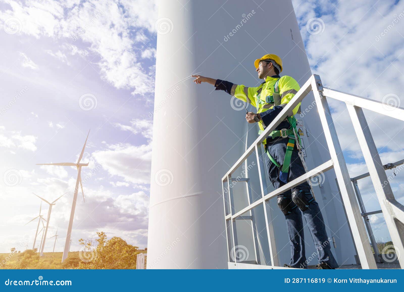 Wind Turbine Technician Checking Service. Engineer Team Professional Working Maintenance Clean ...