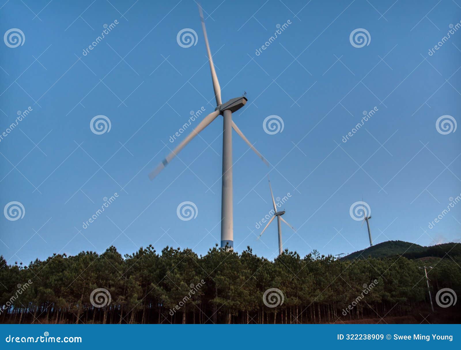 Wind Turbine Tower at the Distance Countryside. Stock Image - Image of ...