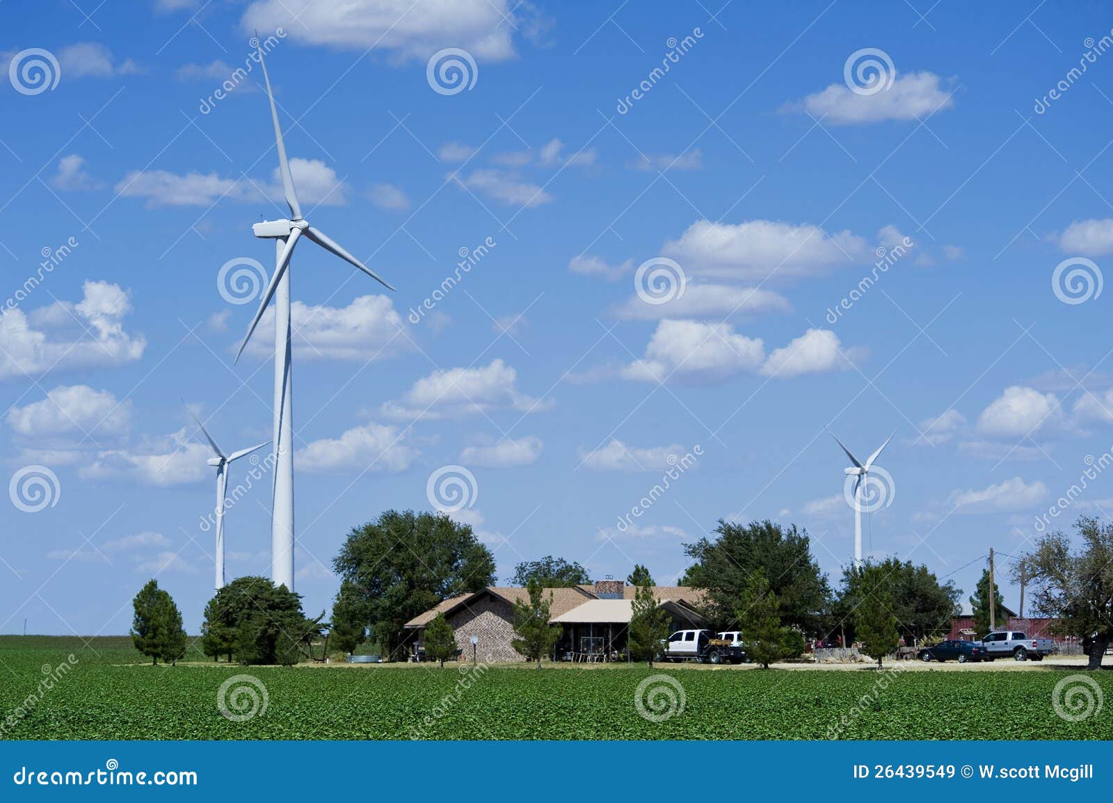 Wind turbines around home stock image. Image of sails - 26439549