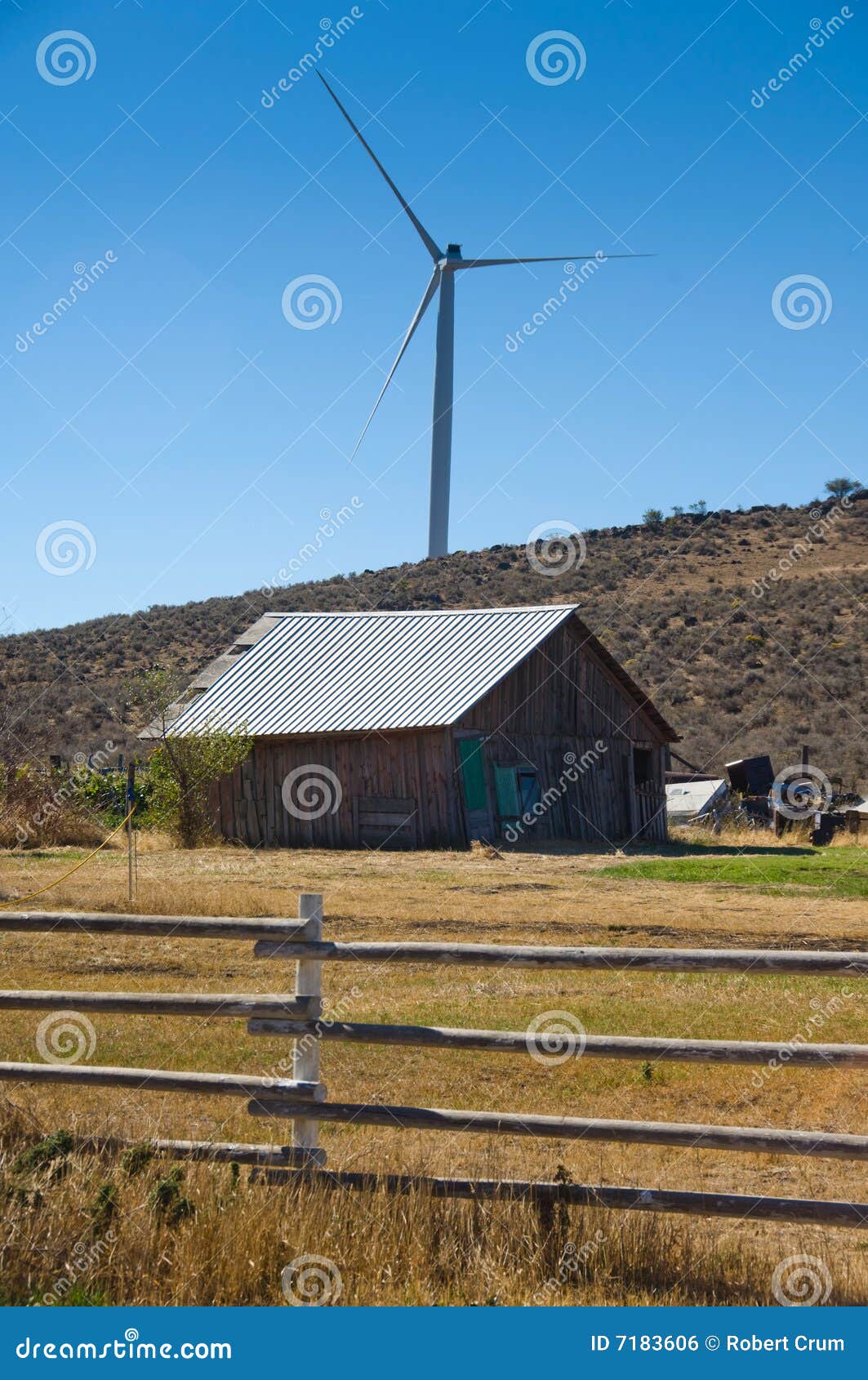 Wind Turbines Behind a Farm Building. Stock Photo - Image of gravel ...