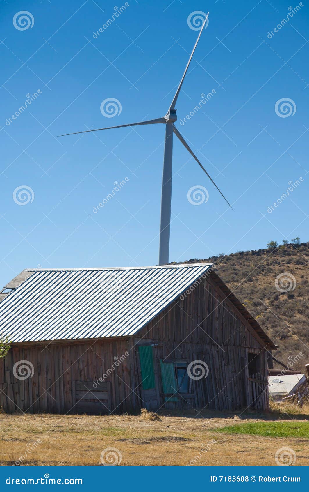 Wind Turbines Behind a Farm Building. Stock Photo - Image of natural ...