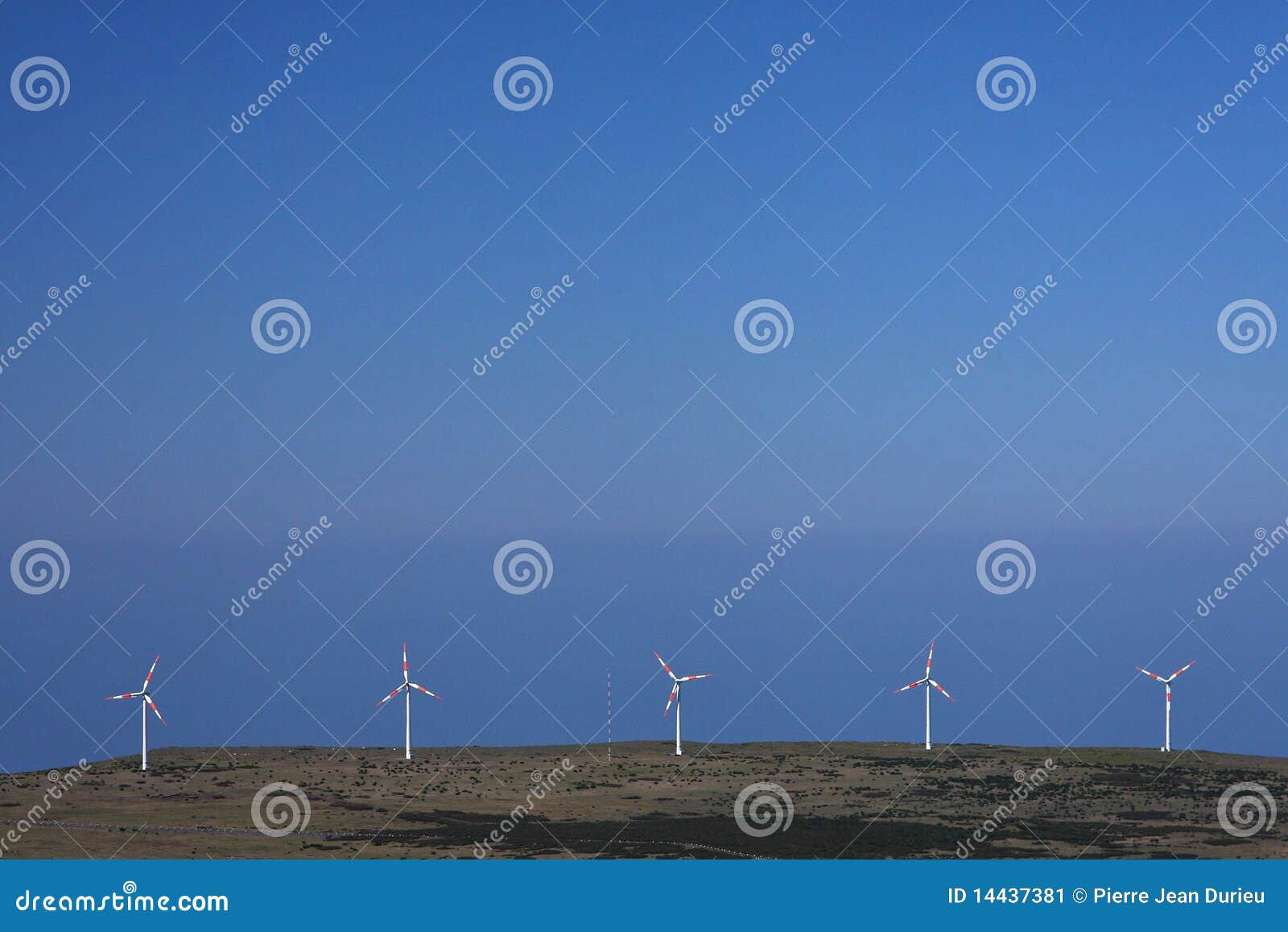 Wind turbines on blue sky stock image. Image of sustainable - 14437381