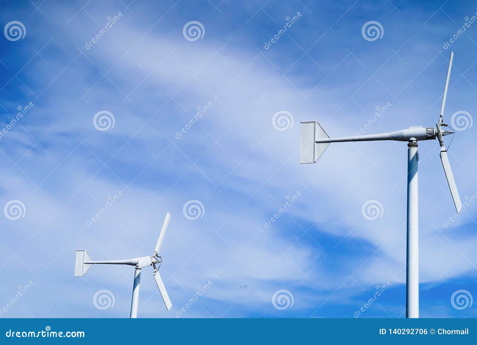Wind turbines on blue sky. stock photo. Image of technology - 140292706