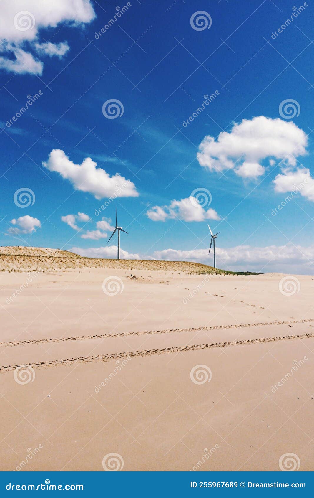 Wind Turbines on a Deserted Beach Stock Image - Image of beach ...