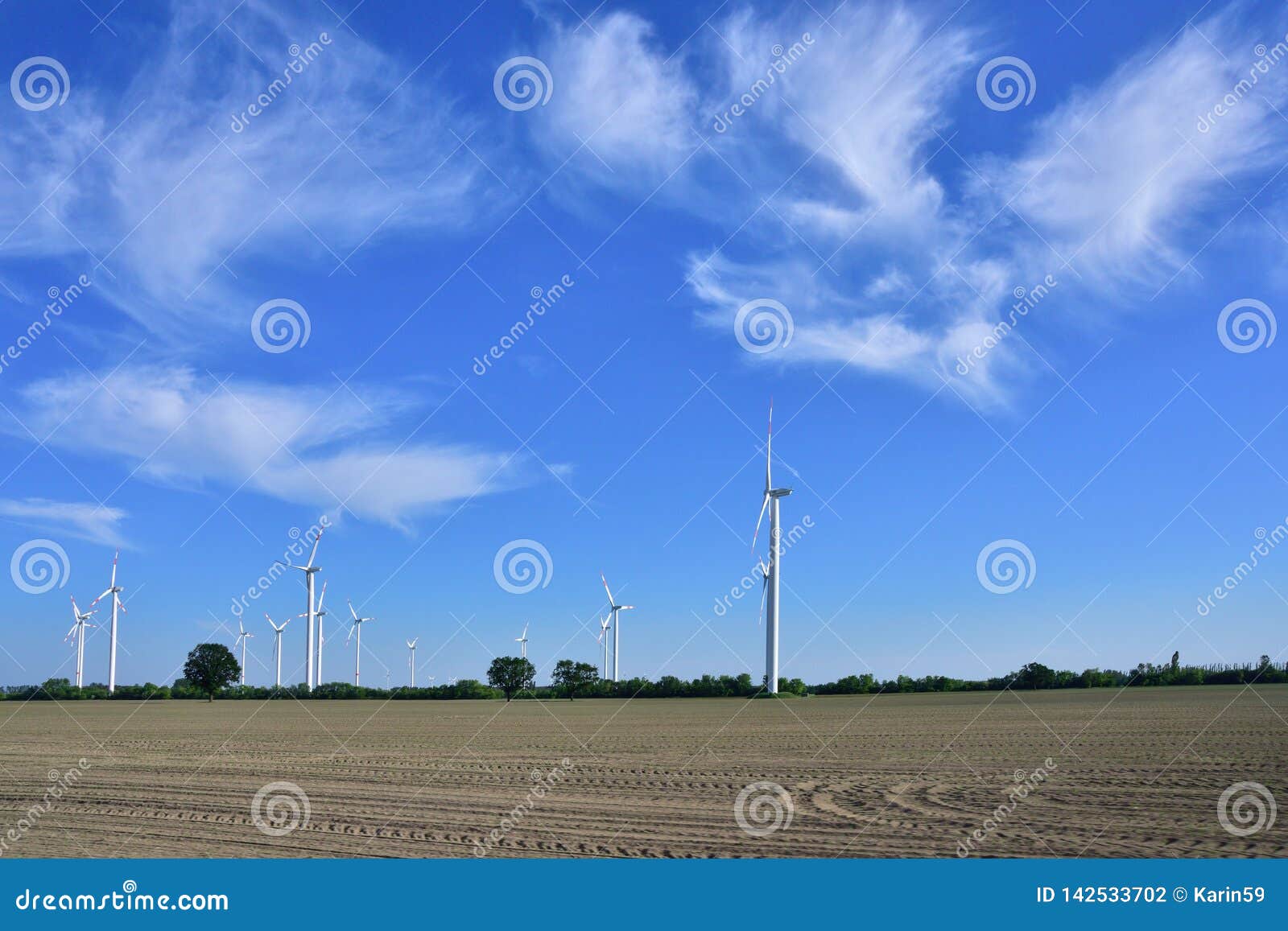 Wind Turbines and Electricity Pylon Stock Photo - Image of power ...