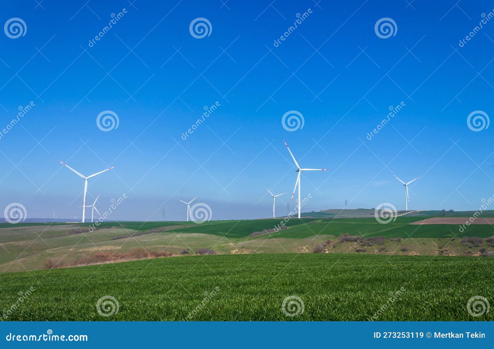 Wind Turbines Generating Energy from the Wind, in Nature, Clear Blue ...