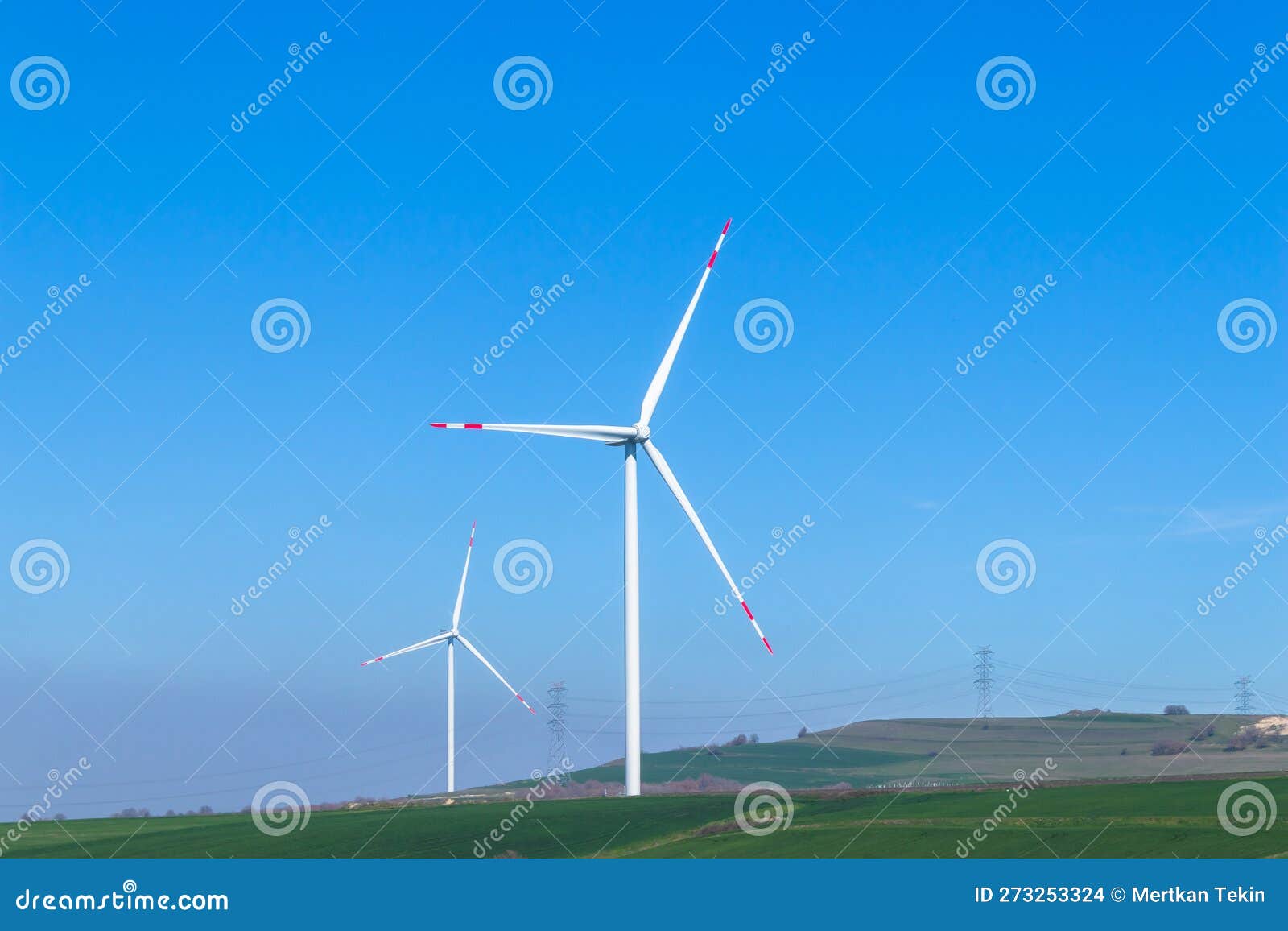 Wind Turbines Generating Energy from the Wind, in Nature, Clear Blue ...