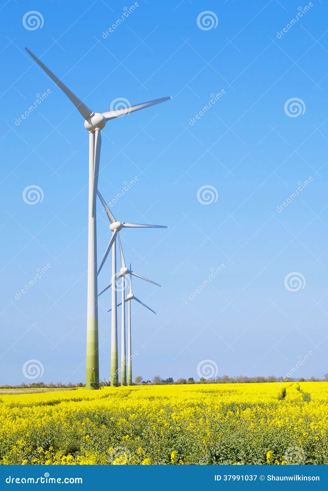 Wind turbines in a line stock image. Image of modern - 37991037