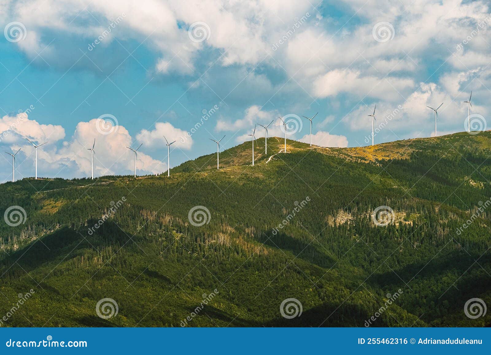 Wind turbines on mountain stock photo. Image of mill - 255462316