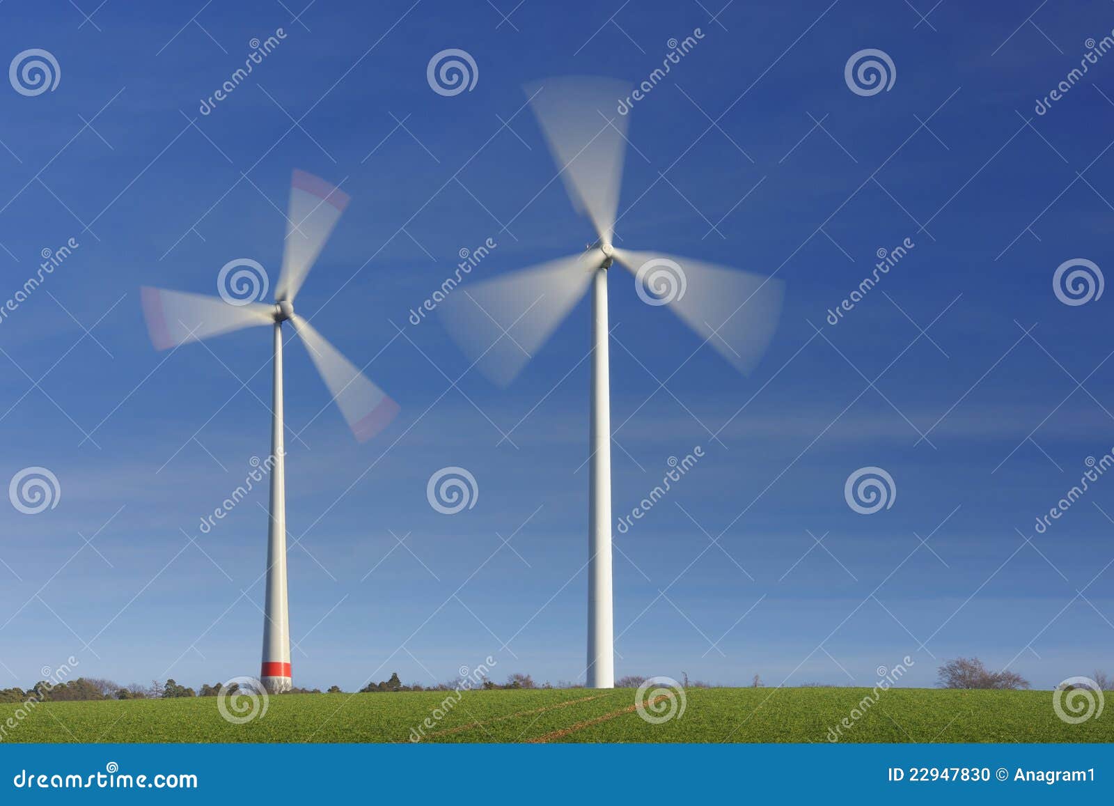 Wind turbines in movement stock photo. Image of blade - 22947830
