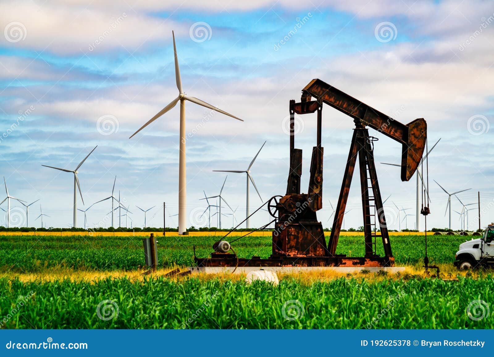 Wind Turbines and Oil Rigs with Large Oil Pump in West Texas Creating ... Wind Turbines and Oil Rigs with Large Oil Pump in West Texas Creating ...
