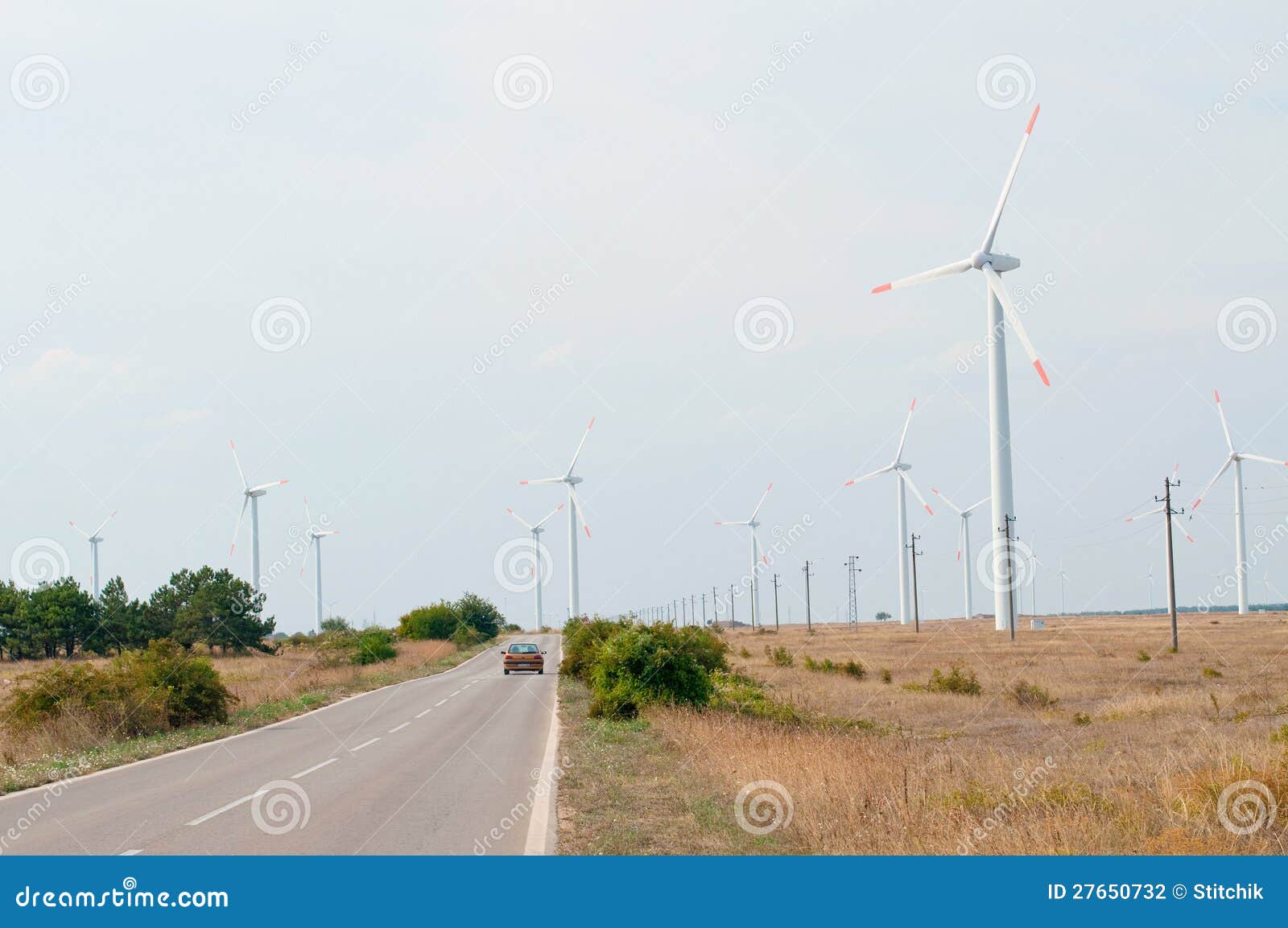 Wind turbines and a road stock photo. Image of automobile - 27650732
